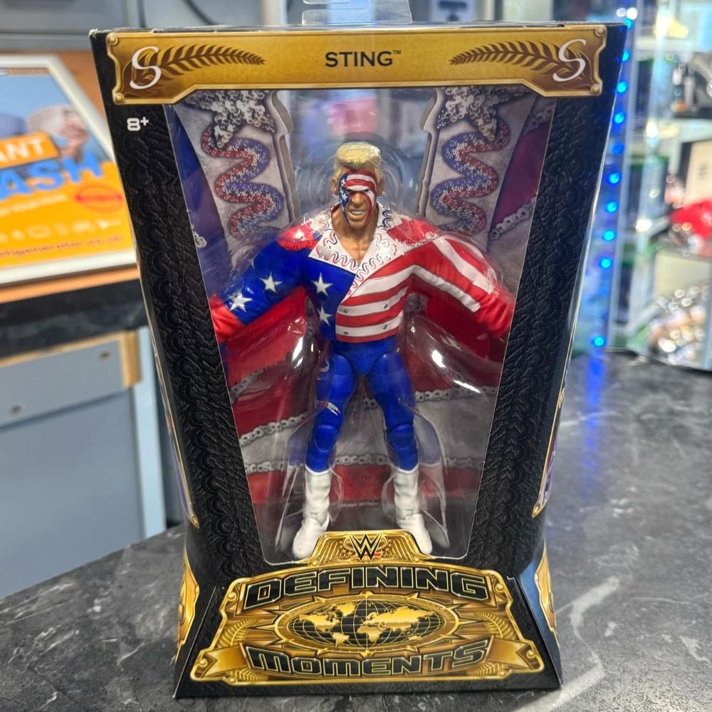 Pre-owned WWE Defining Moments Sting Action Figure - Own4Less